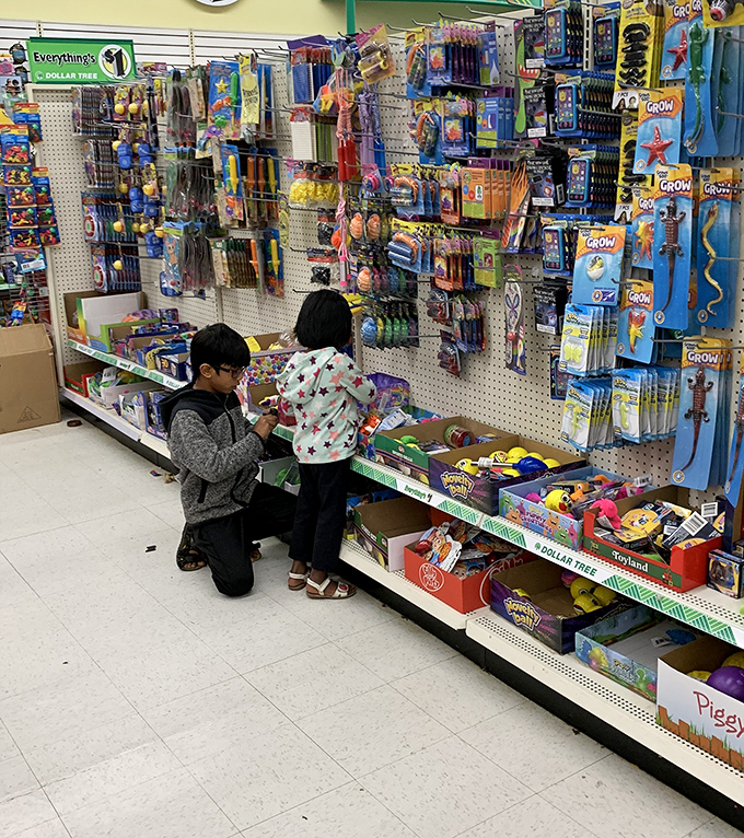 Young treasure hunters discovering the joy of affordable toys&mdash;childhood wonder doesn't need a premium price tag.