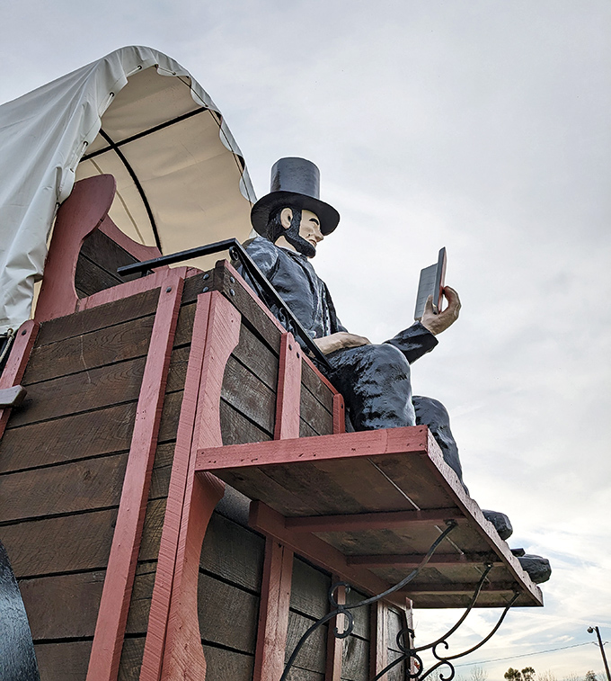 Looking up at greatness&mdash;literally. This perspective makes you appreciate both the craftsmanship and the slightly surreal nature of a presidential figure perched atop a giant wagon.