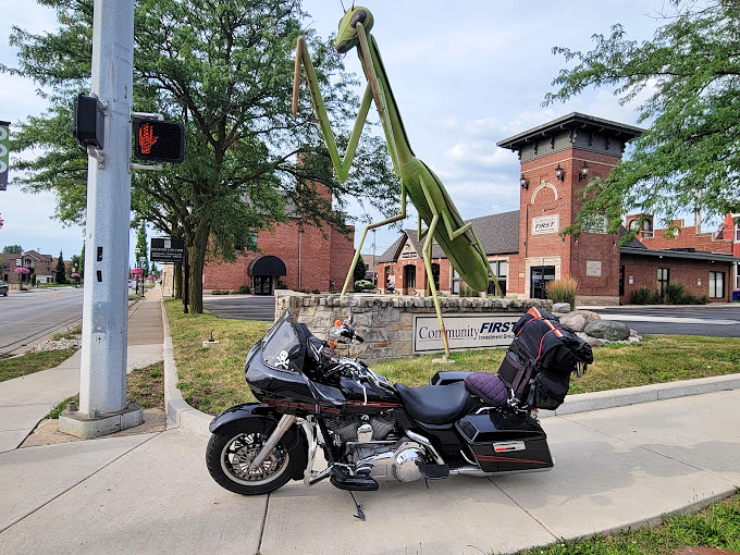 Even road warriors pause their journeys to pay homage to the great green guardian of Kokomo's busiest intersection.