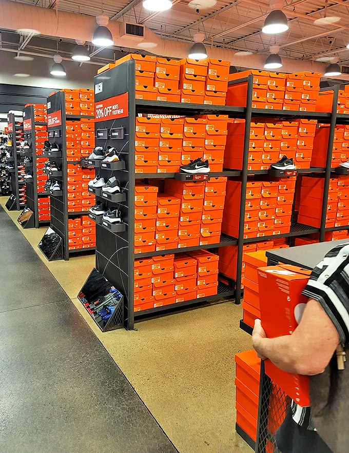 The wall of orange boxes at Nike is like a temple to footwear possibilities&mdash;each one containing potential adventures.