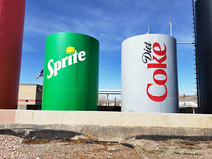 Sprite's vibrant green and Diet Coke's crisp white-and-red create a colorful contrast that pops against the desert landscape.