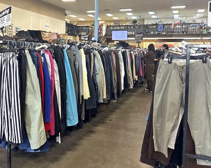 
The pants section: where patience meets payoff. Each hanger holds the possibility of finding that perfect pair someone else mysteriously abandoned.