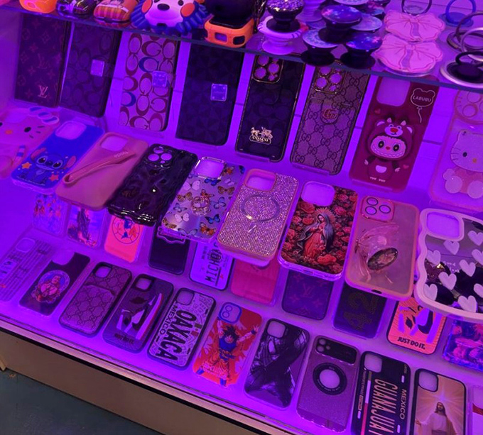 Under purple lights, phone cases become gallery-worthy art pieces. Your smartphone deserves a wardrobe change too, doesn't it?