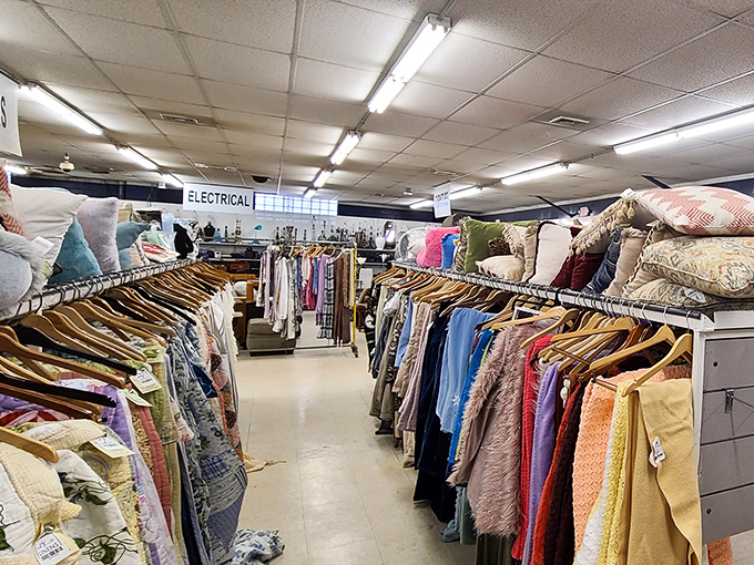 The clothing aisles stretch toward infinity, organized in a system that makes perfect sense to the initiated and bewilders first-timers in the most delightful way.