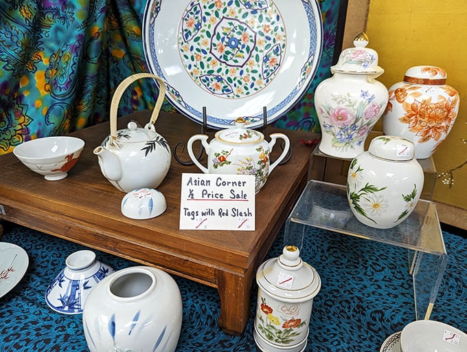 The "Asian Corner" display showcases delicate porcelain treasures. One person's downsized collection becomes another's dining table conversation piece.
