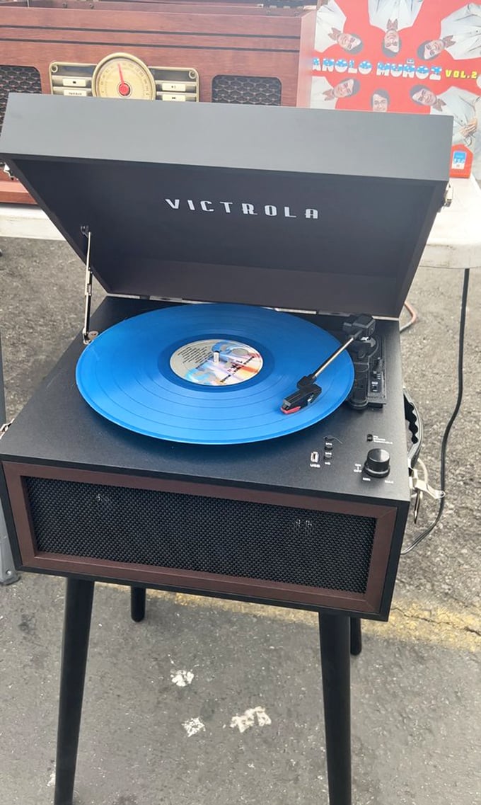 Vinyl revival in full swing! This Victrola turntable with its vibrant blue record might just reconnect you with your teenage musical obsessions.