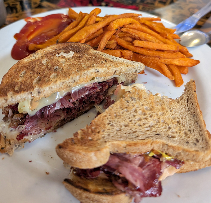 The Reuben sandwich&mdash;where corned beef, sauerkraut, and Swiss cheese perform a perfectly choreographed dance between two slices of grilled rye.