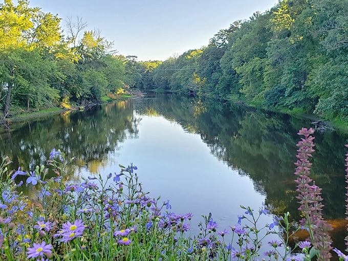 The Farmington River provides the perfect mirror, doubling the scenery in a way no filter could improve upon.