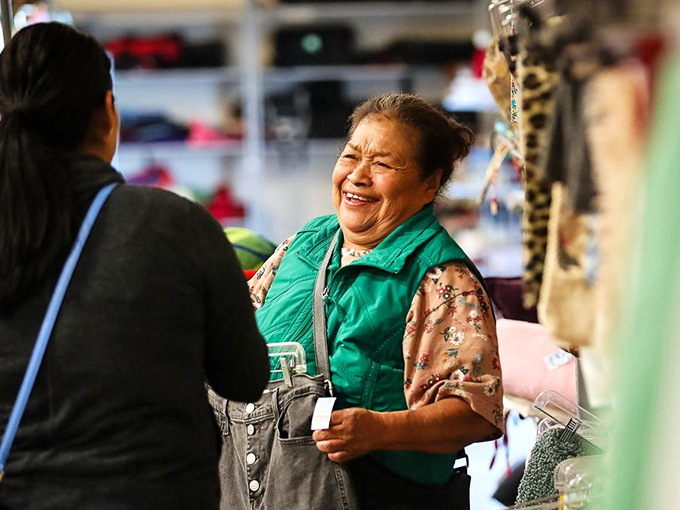 The universal language of thrift store triumph&mdash;that smile when you've found exactly what you didn't know you needed.