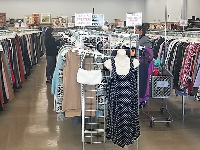 Treasure hunters scan the racks with practiced eyes. Like paleontologists of fashion, they can spot a designer label hiding among polyester from twenty paces.