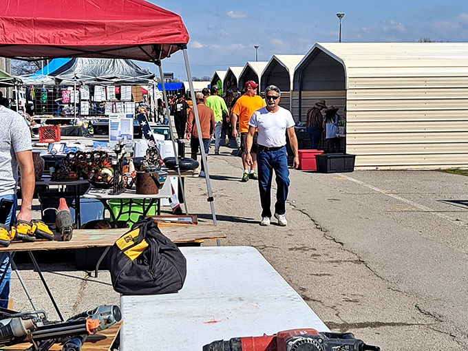 The outdoor market buzzes with weekend warriors hunting for deals. Notice how everyone walks with that "I might find something amazing" stride.