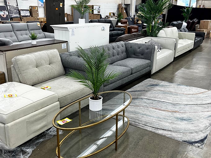 Living room goals on a realistic budget. That gold-rimmed coffee table is practically begging to host your next book club.