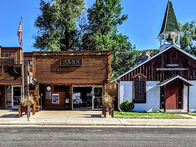 The historic bank and Union Congregational Church stand side by side &ndash; commerce and faith, the twin pillars of frontier towns.
