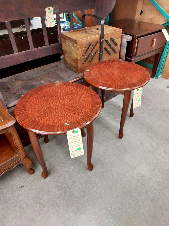 Mid-century side tables with inlaid wood patterns that whisper, "Yes, I have excellent taste" without shouting about the bargain price.