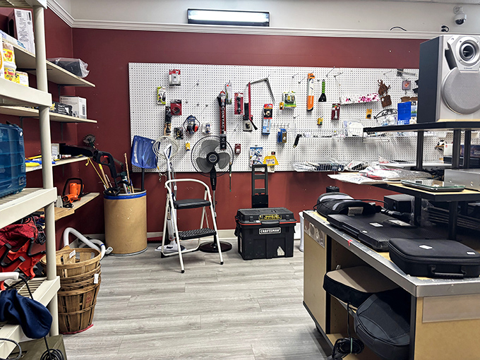 The tool section &ndash; where DIY dreams and abandoned home improvement projects find new purpose. That pegboard has seen more gadgets than a hardware store convention.