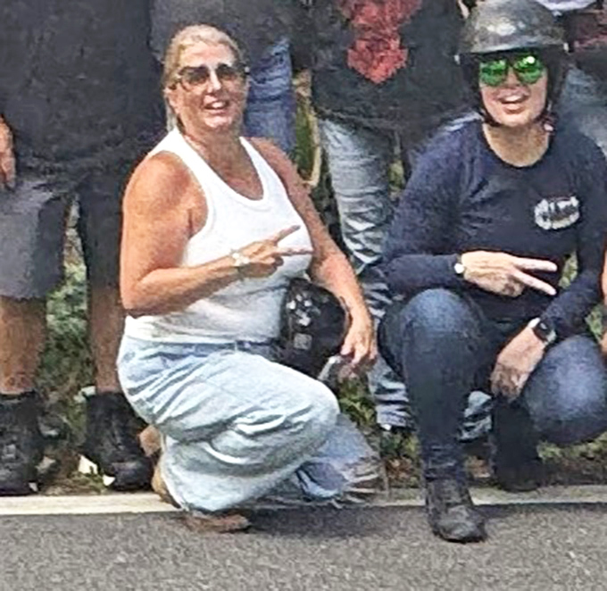 Fellow travelers pausing to appreciate this slice of Old Florida, where the simple act of stopping becomes part of the experience. 