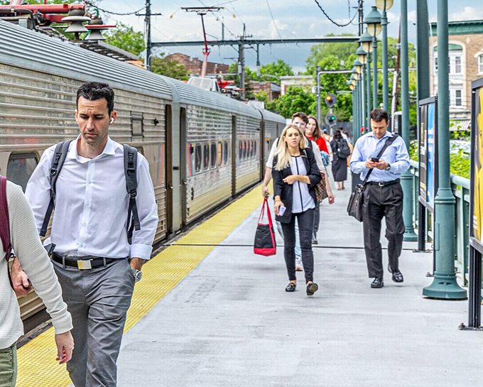 Commuters stream from NJ Transit trains, connecting Montclair to Manhattan in just 30 minutes. City careers with suburban sanity—the perfect compromise.