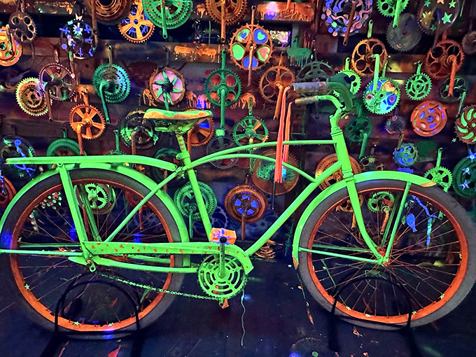 This vintage Schwinn cruiser glows under blacklight like a radioactive dream machine from a 1950s sci-fi movie gone wonderfully right.