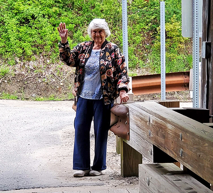 Inside looking out: the bridge's wooden skeleton creates a cathedral-like passage toward daylight and adventure.