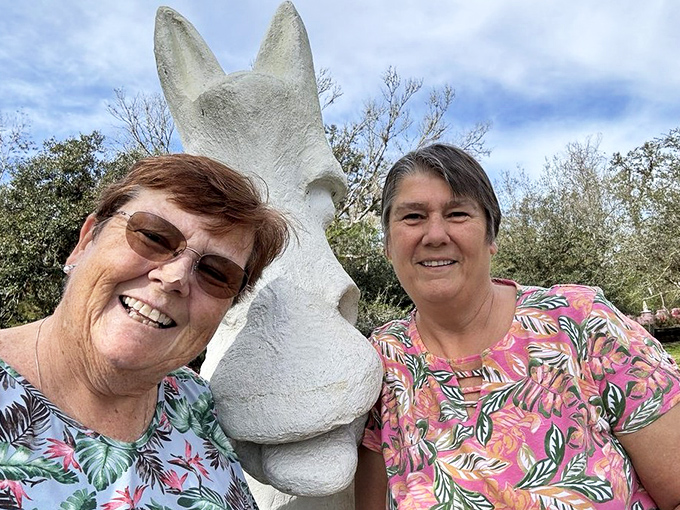 The sculpture provides the perfect photo opportunity, standing tall like Florida's answer to Mount Rushmore, just more whimsical and ear-focused.