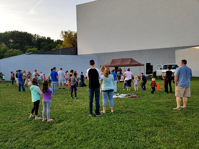 Pre-show gatherings create community under open skies. Some friendships are forged while waiting for darkness to fall.