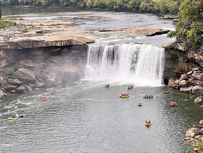 Adventure seekers float beneath the falls, proving that Kentucky's version of a water park doesn't need artificial wave machines.