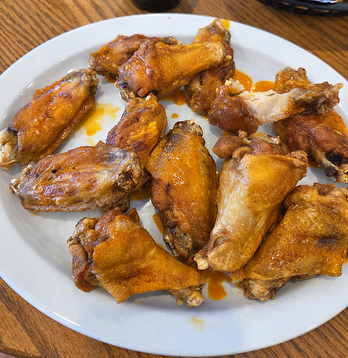 Wings so perfectly golden they deserve their own trophy case. These aren't just wings—they're life-affirming flavor vehicles.