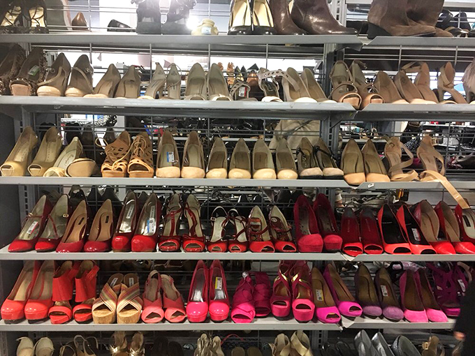 Shoe heaven exists, and it's organized by color! Those red pumps are practically screaming "Take me to dinner somewhere fancy!"
