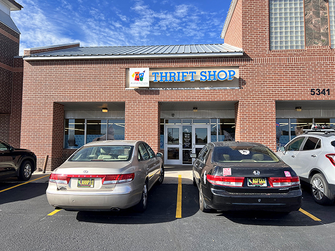 The Animal Humane Thrift Shop's brick facade and cheerful signage invite you to shop with purpose. Every purchase helps furry friends find homes.