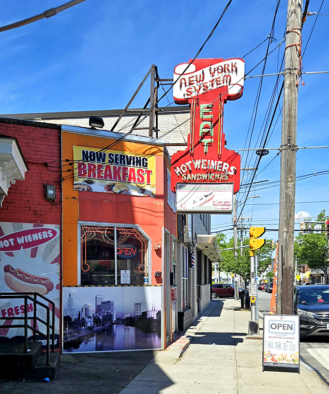 That classic neon sign has guided hungry Rhode Islanders to hot wiener heaven for generations.