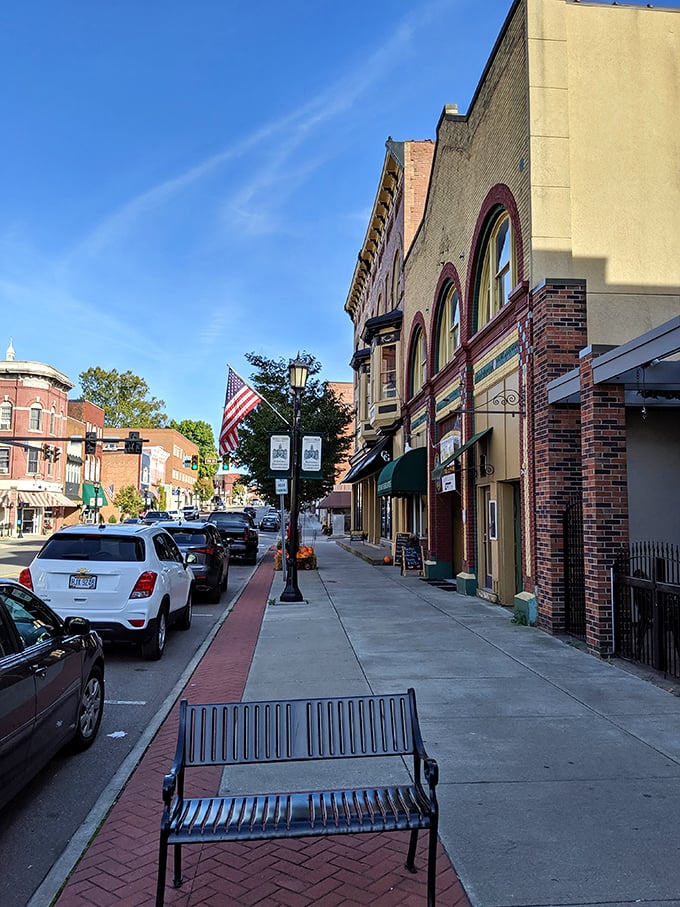 Sidewalk benches invite you to sit and watch small-town life unfold at budget-friendly prices.