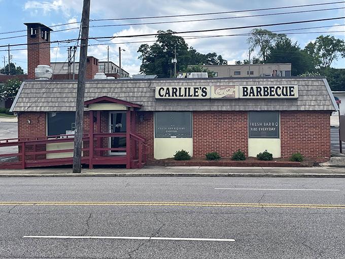 Carlile's Coca-Cola sign has been pointing hungry folks to BBQ heaven longer than most of us have been eating solid food.