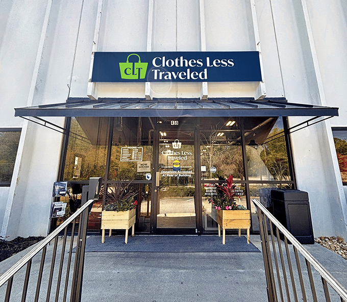 That sophisticated entrance with planters suggests this isn't your grandmother's dusty thrift store&mdash;quality awaits inside those modern doors.