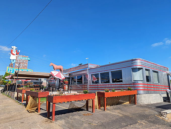 Davie's Chuck Wagon Diner gleams in classic silver diner-car style. That cowboy sign has been lassoing hungry travelers off Colfax for generations.
