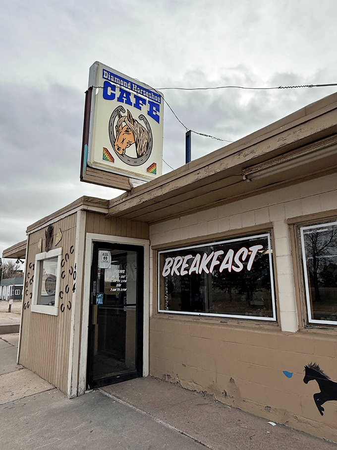 The Diamond Horseshoe's vintage sign promises exactly what you'll get: authentic Wyoming dining without any fancy frills or wallet-emptying prices.