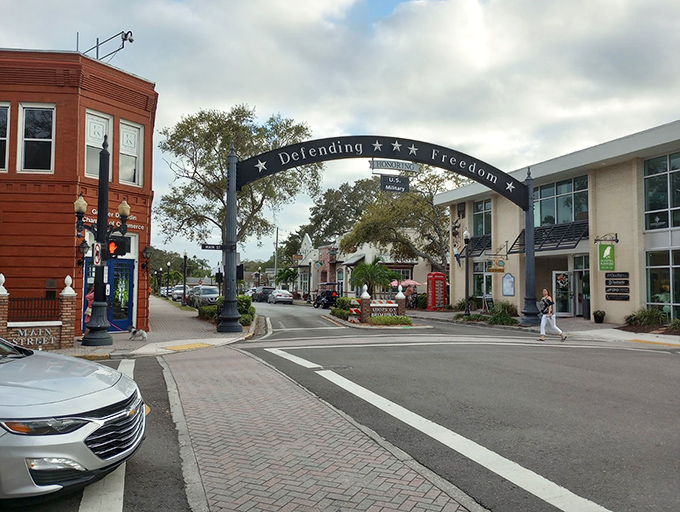 Dunedin&rsquo;s iconic &ldquo;Defending Freedom&rdquo; archway welcomes you into a friendly downtown filled with walkable streets, local shops, and small-town charm.