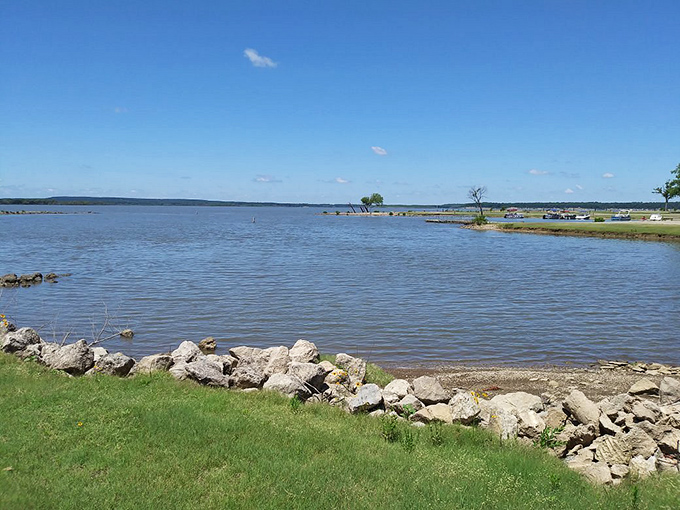 Elk City's tranquil shoreline. The perfect spot to cast a line, clear your mind, and pretend your inbox doesn't exist.