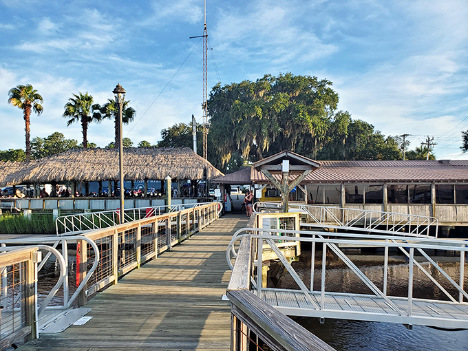 Fish Tales' wooden walkways lead to seafood paradise&mdash;where tiki huts, palm trees, and sunset views make "just one more bite" turn into three more hours.