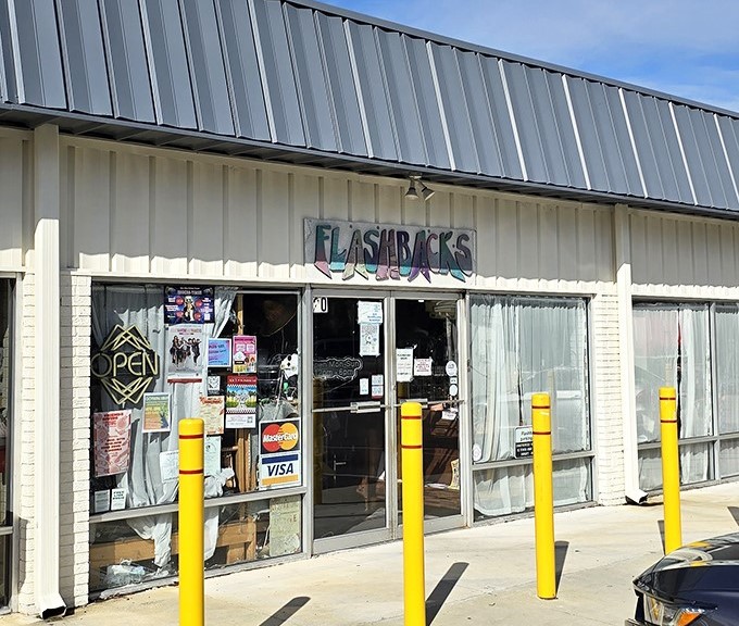Flashbacks' modest storefront hides a time machine of fashion treasures &ndash; decades of style waiting behind those unassuming doors.