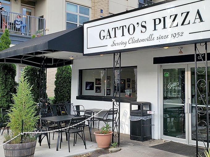 That clean, classic storefront design tells you everything - this place focuses on what really matters: the pizza.