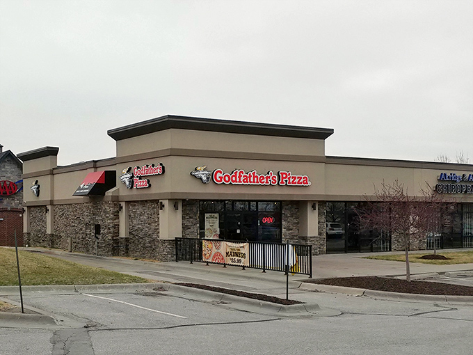 Godfather's Pizza makes you an offer you can't refuse: hearty Midwestern pizza in a building that means business.