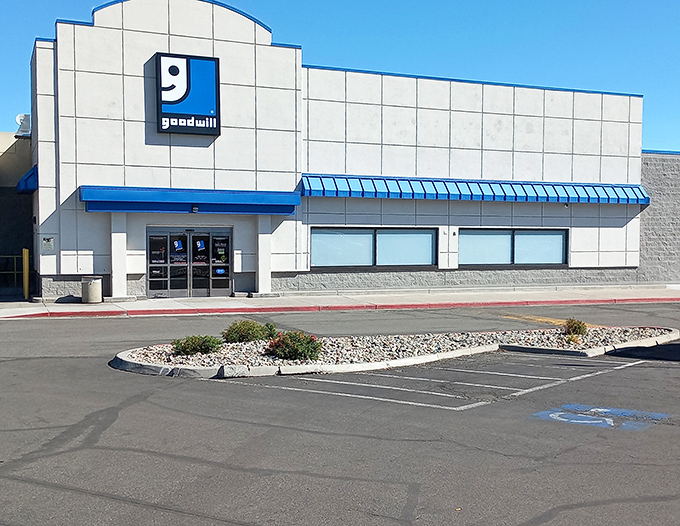 Goodwill hunting made easy! This clean-lined Reno location gleams under the Nevada sun, its blue accents as welcoming as finding designer labels at thrift prices.