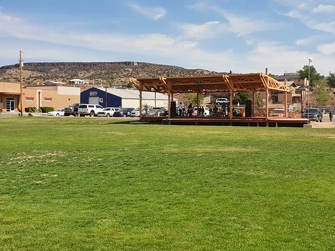 A peaceful town square in Grants, where the wooden pavilion invites community gatherings under the watchful gaze of mesa landscapes.