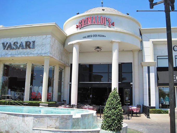 Grimaldi's elegant entrance and fountain set the stage for coal-fired pizza perfection.
