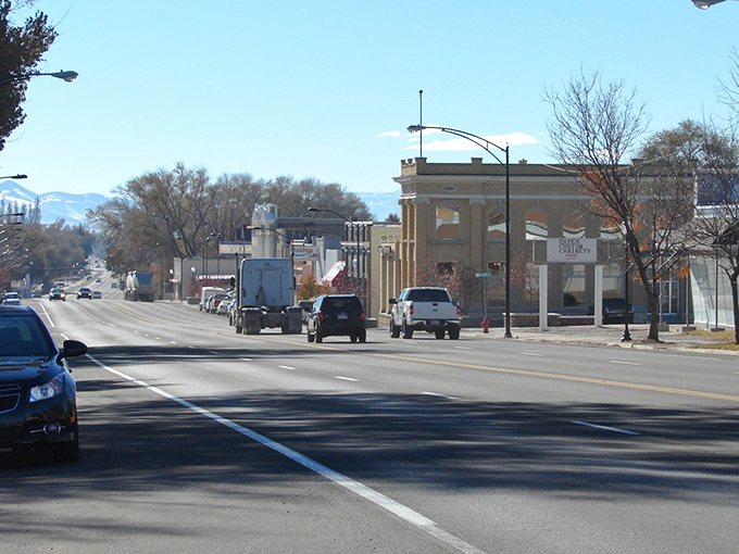 Midland Square's iconic clock tower stands as Gunnison's beloved landmark and community gathering spot.