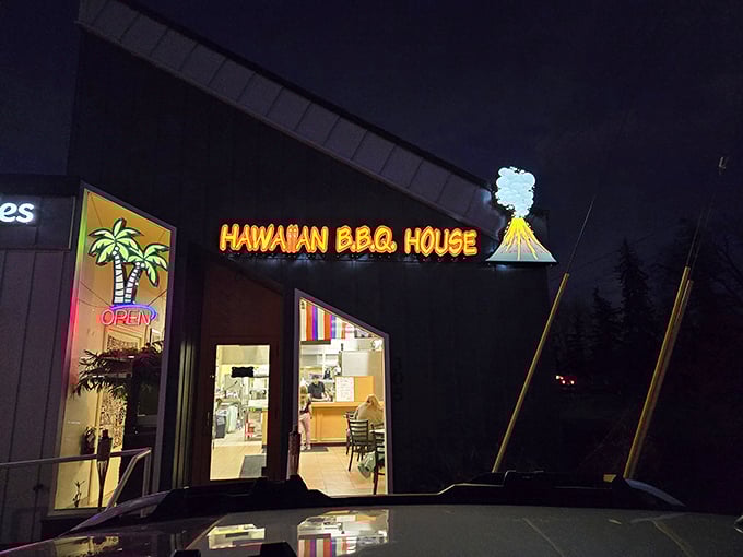 That volcano sign with real smoke? Pure genius - Hawaiian BBQ announcing itself like a tropical storm.