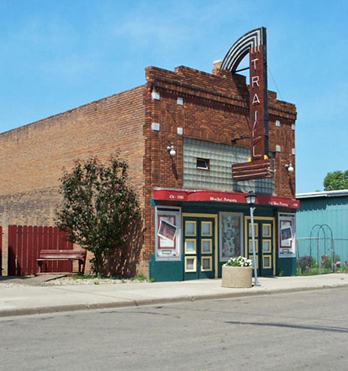 The Trail Theater's marquee stands as a monument to simpler entertainment, before streaming services required sixteen passwords.
