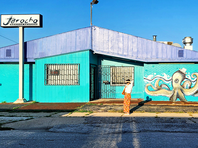 Jarocho's turquoise facade pops against the Kansas sky like a piece of the Mexican coast transported inland. That octopus mural is practically waving you inside!