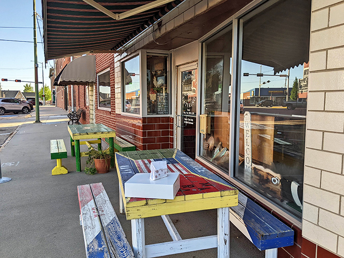 Small-town charm meets serious baking skills - those colorful picnic tables promise good times ahead. 