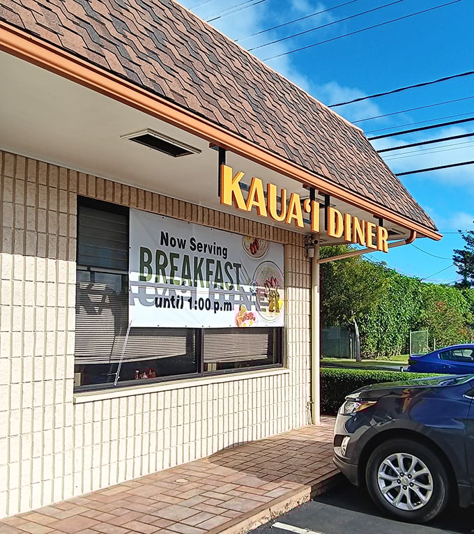 Brick-colored tiles and bold lettering announce a breakfast destination that doesn't need fancy marketing to draw crowds.